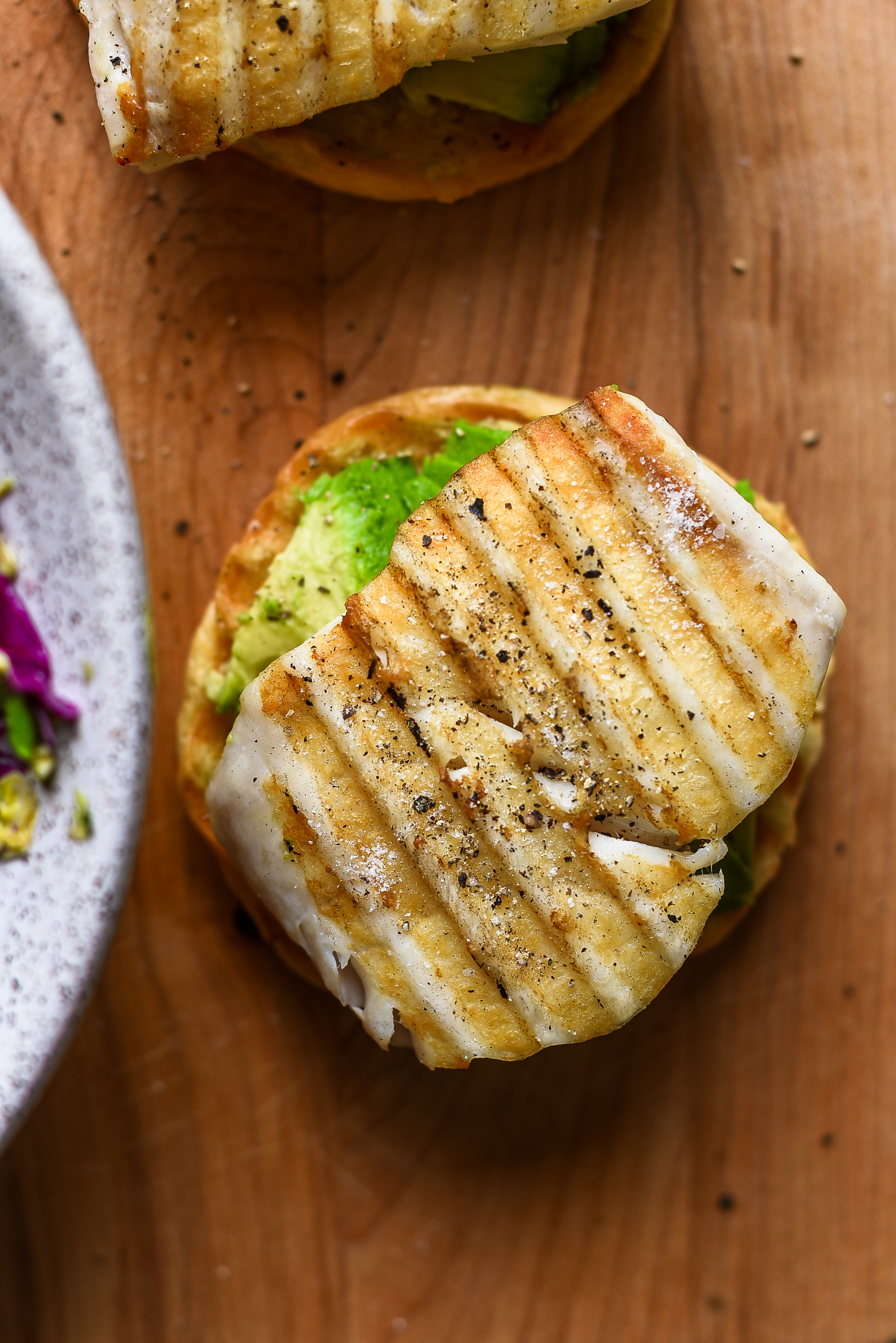 Halibut Burger with Spicy Brussels Slaw | Nourish Deliciously