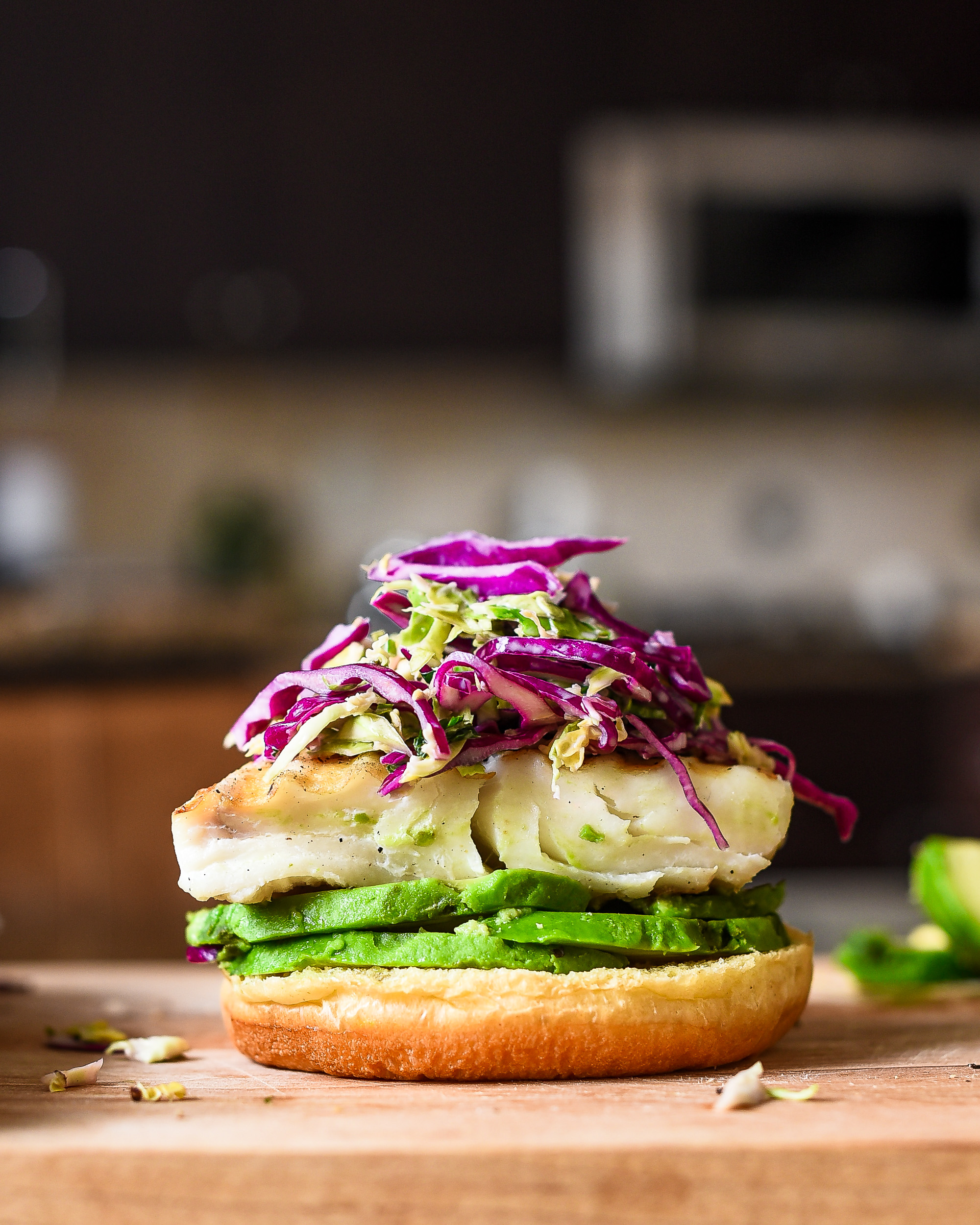 Halibut Burger with Spicy Brussels Slaw | Nourish Deliciously