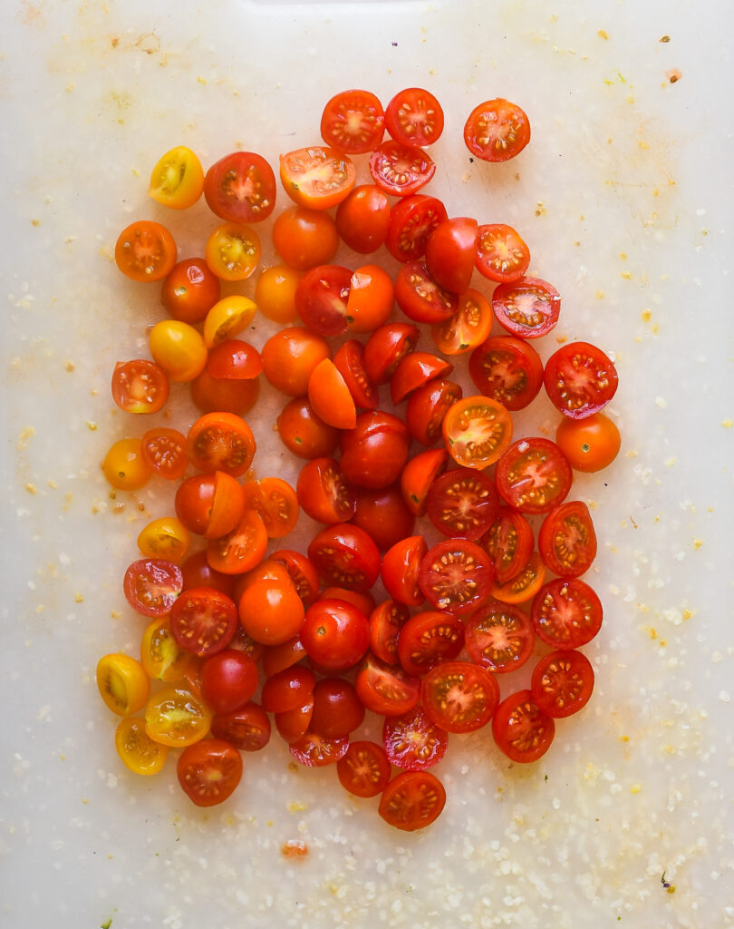 Spicy Burst Tomatoes with Baked Feta | Nourish Deliciously
