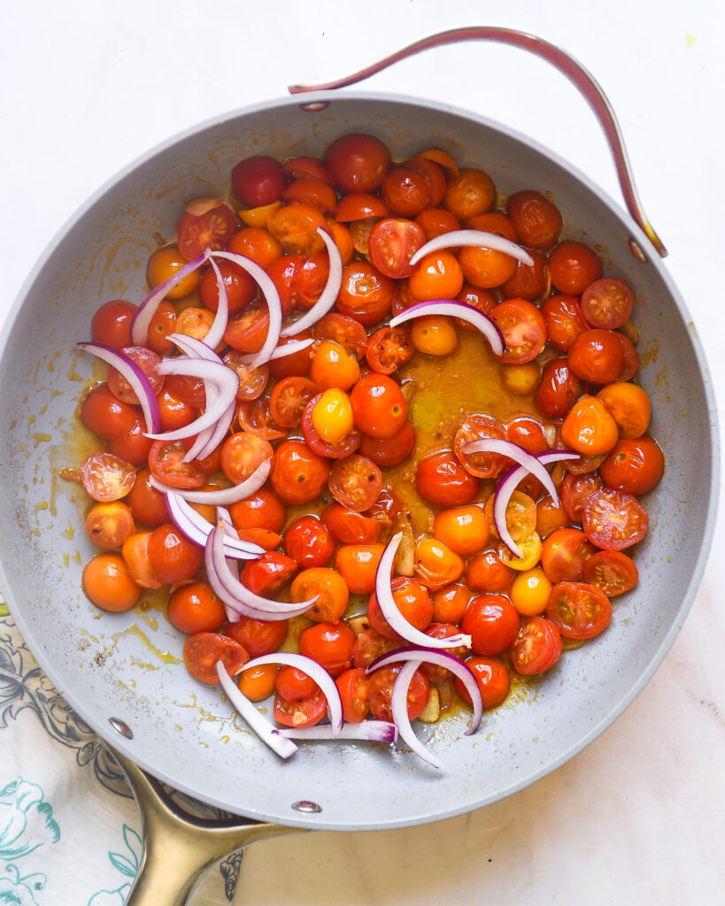 Spicy Burst Tomatoes with Baked Feta | Nourish Deliciously